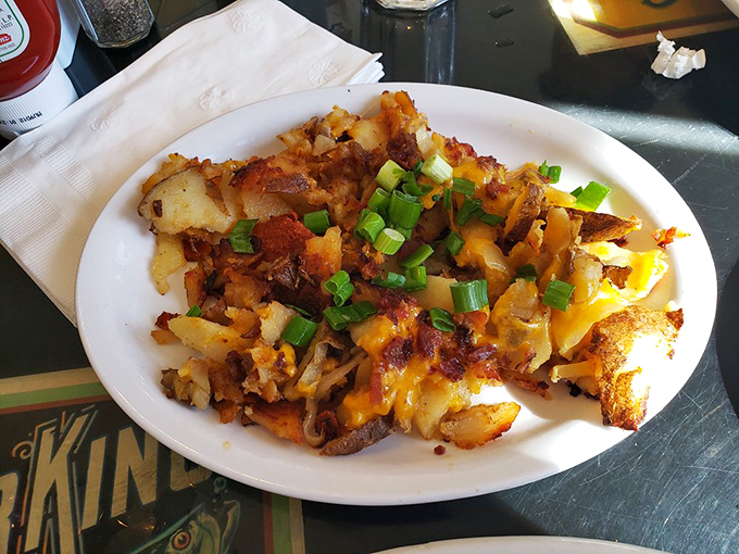 These loaded homefries aren't just a side dish &ndash; they're a masterpiece of crispy potatoes, melted cheese, and green onions that puts regular fries in therapy.