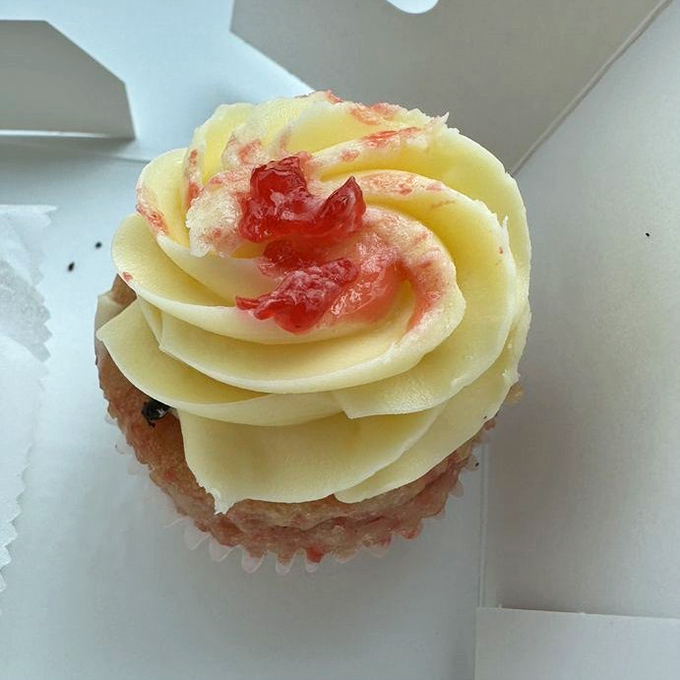 This cupcake doesn't just have frosting&mdash;it's wearing a crown fit for bakery royalty. The cherry on top isn't just a suggestion.