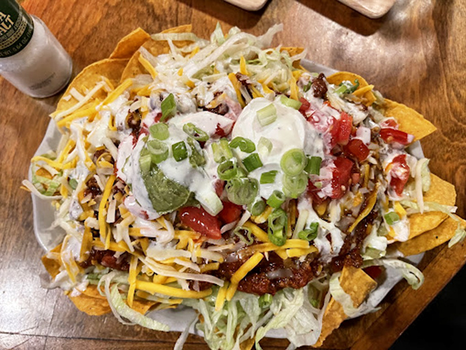 Nachos that require a strategy to eat&mdash;like a delicious Jenga tower where every pull reveals another layer of flavor beneath.