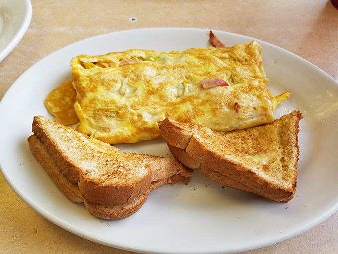 An omelet that's achieved that perfect balance between fluffy and substantial, flanked by toast that's actually worthy of the eggs.
