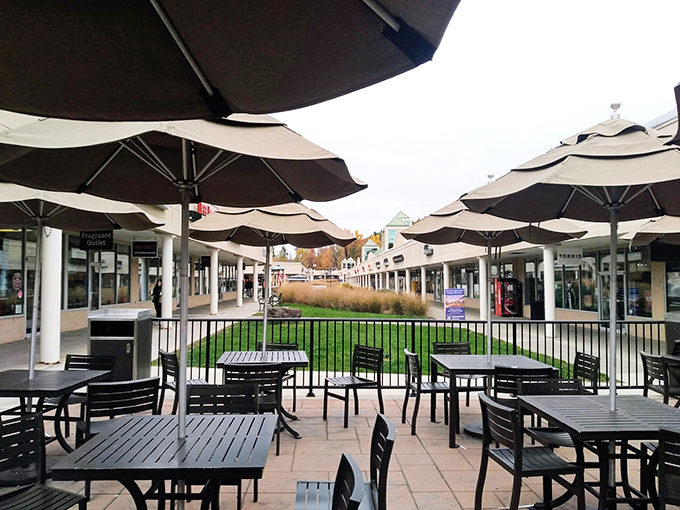 Between shopping sprees, these umbrella-shaded tables offer respite for weary feet and hungry wallets. Retail therapy's intermission has never looked so inviting.
