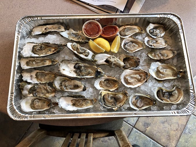 Fresh oysters on ice, looking like little treasures from Neptune's jewelry box, ready for their moment of glory.