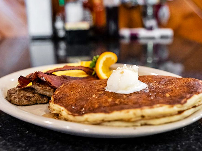 Pancakes so perfectly golden they deserve their own sunrise soundtrack, complete with a dollop of butter slowly performing its melty magic.