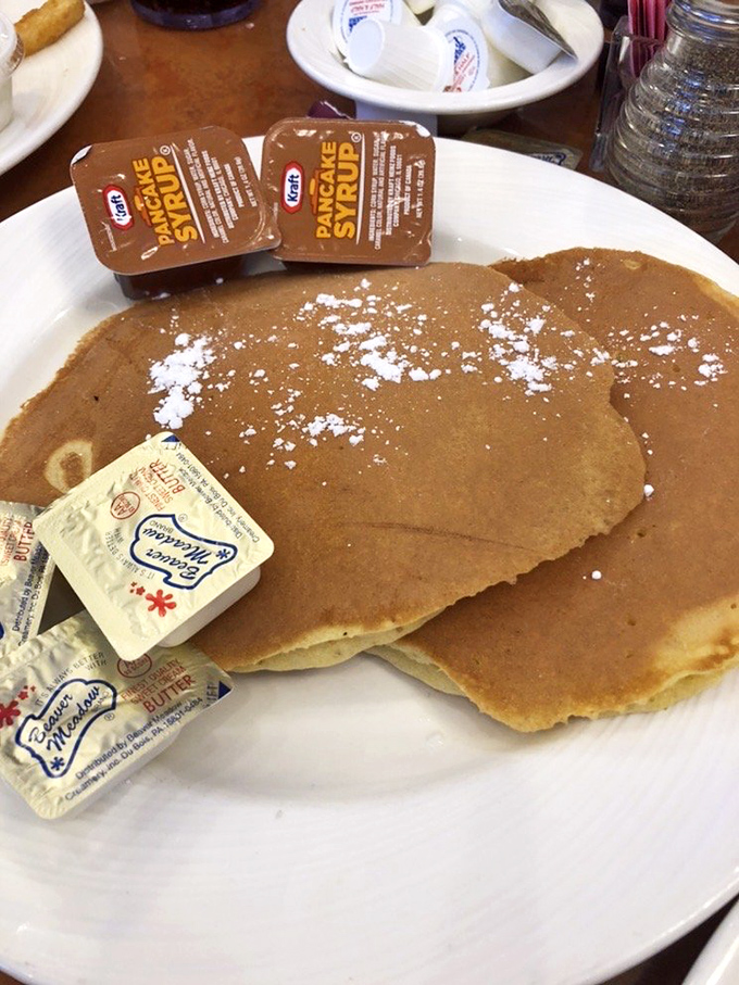 Pancake perfection doesn't happen by accident. These golden-brown beauties are what breakfast dreams are made of—powdered sugar optional but recommended.