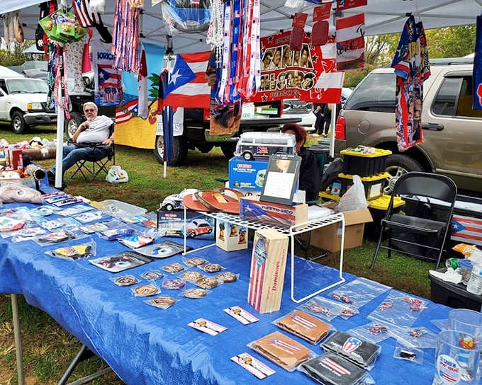 Patriotism meets merchandising magic. This red, white, and blue display creates a festival atmosphere where flags and memorabilia celebrate cultural heritage.