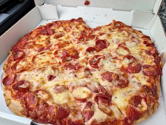 This pepperoni pizza isn't trying to reinvent the wheel&mdash;it's just perfecting it with those gloriously curled, crisp-edged pepperoni cups holding liquid gold.