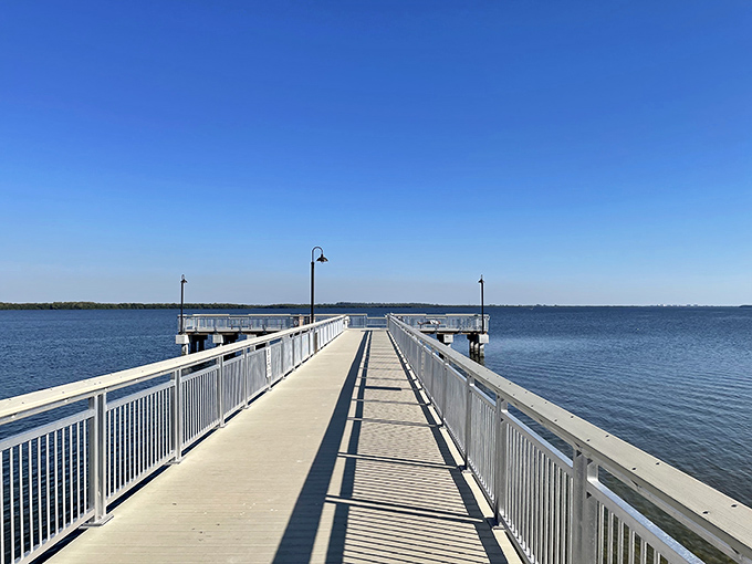This pristine fishing pier stretches toward endless horizons. It's not just a place to cast a line&mdash;it's where time slows to a perfect standstill.