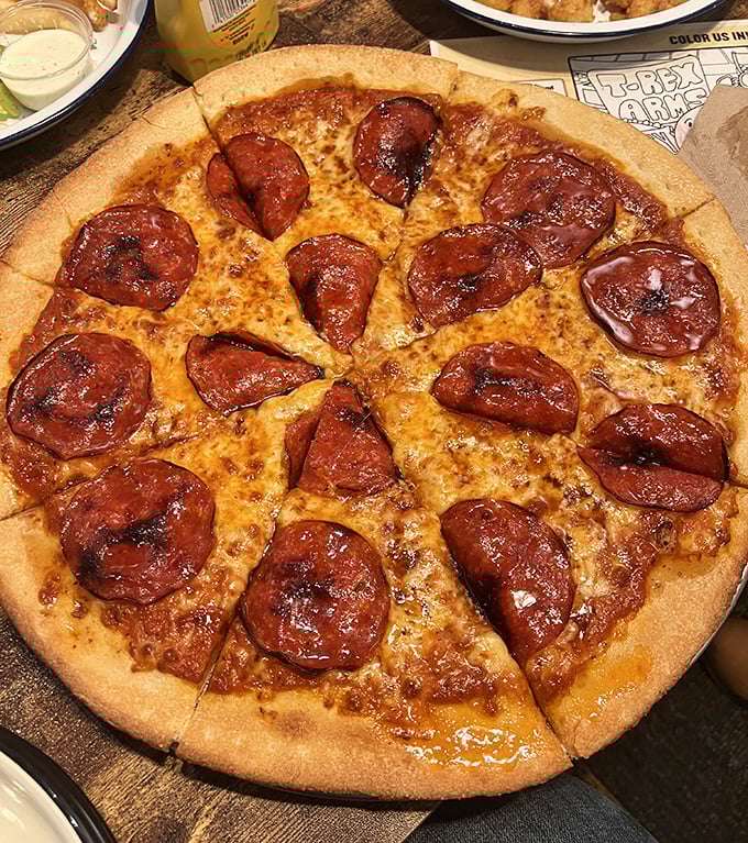 Pizza perfection isn't complicated: a chewy crust, melted cheese, and pepperoni that curls into little flavor cups collecting their own savory oils.