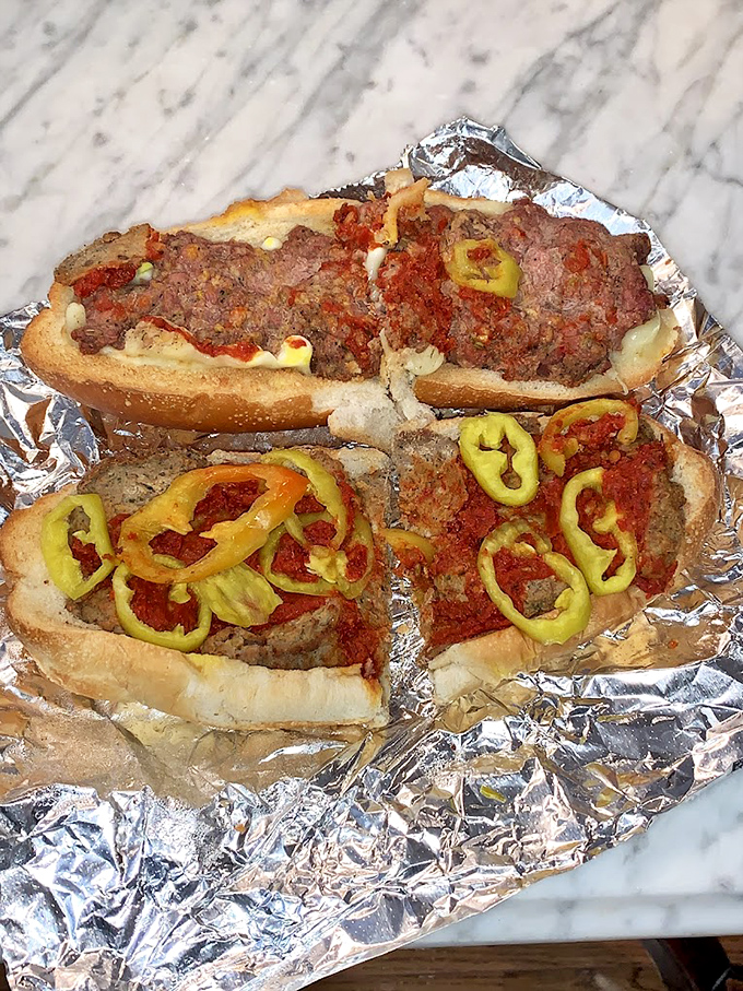 Not all heroes wear capes. This homemade pizza sub with banana peppers delivers a symphony of flavors that puts ordinary sandwiches to shame.