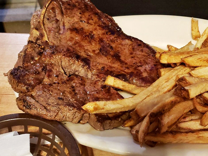 A porterhouse that would make Ron Swanson weep tears of joy. Perfectly seared, generously portioned, and paired with hand-cut fries that deserve their own fan club. 