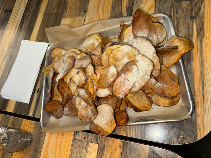 These homemade potato chips arrive golden and crispy, proving that sometimes the simplest pleasures are the best ones.