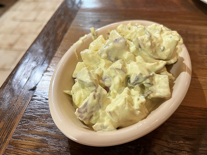 Potato salad so creamy it could make your grandmother question her own recipe after 40 years of family reunions.