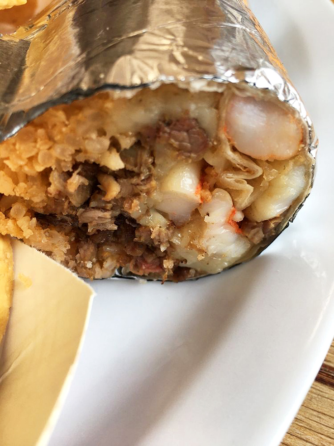 Behold the cross-section of burrito perfection&mdash;where rice, beans, and meat achieve the kind of harmony that most symphony orchestras only dream about.