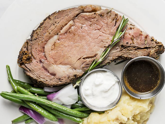 Prime rib so perfectly prepared it deserves its own historical marker, accompanied by sides that refuse to be overshadowed by the main attraction.