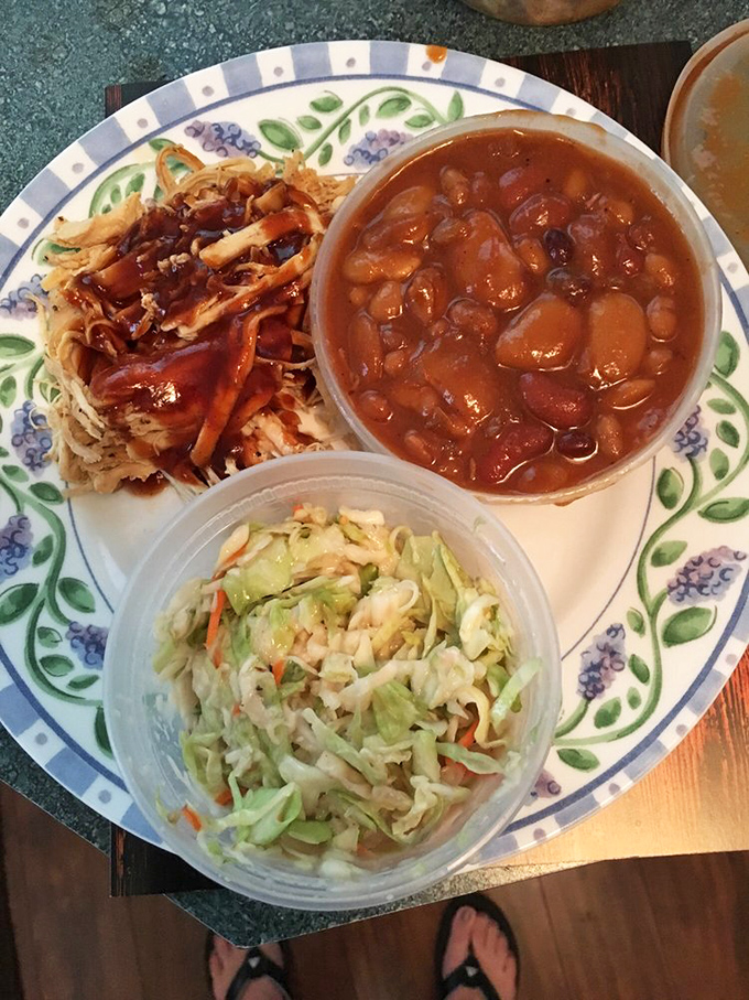 Pulled chicken, coleslaw, and beans &ndash; the holy trinity of barbecue sides that makes every meal feel like Sunday dinner.