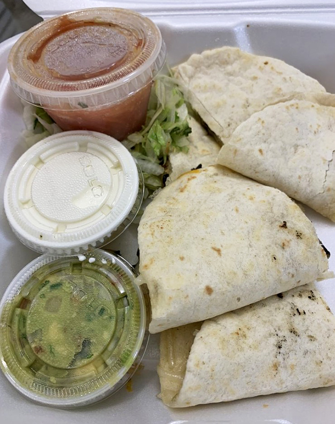 Wrapped perfection to-go! These flour tortilla bundles are like edible treasure chests filled with savory fillings and paired with house-made sauces.