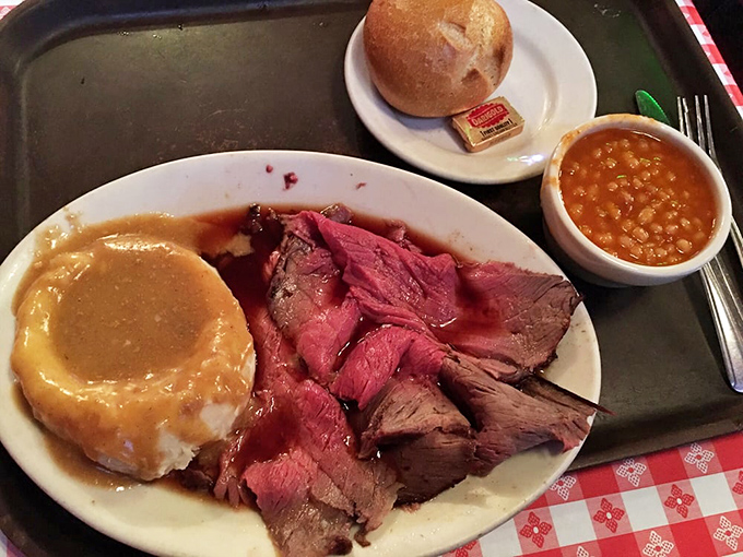 Roast beef carved to order, a golden mound of mashed potatoes, and beans that have been perfecting themselves for hours&mdash;this is what satisfaction looks like on a plate.