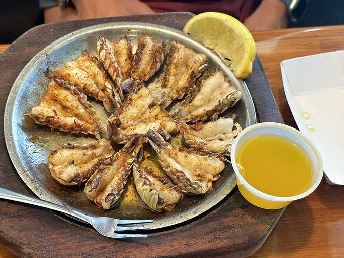 Rock shrimp: Florida's answer to lobster. Split, broiled, and ready for their butter bath&mdash;nature's perfect delivery system for oceanic flavor.