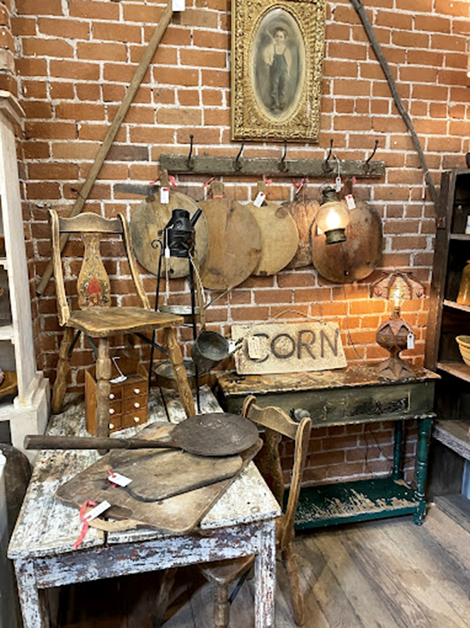 Wooden bread boards and weathered furniture create a rustic kitchen tableau that would make Joanna Gaines reach for her wallet.