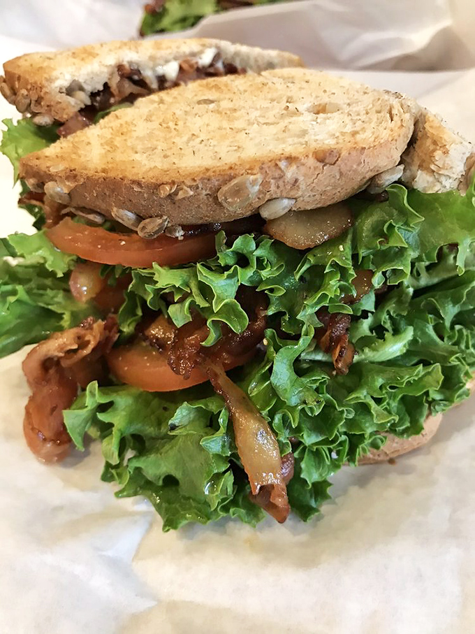 This isn't just a sandwich; it's an architectural marvel of bacon, lettuce, and tomato on hearty bread. The Taj Mahal of BLTs awaits.