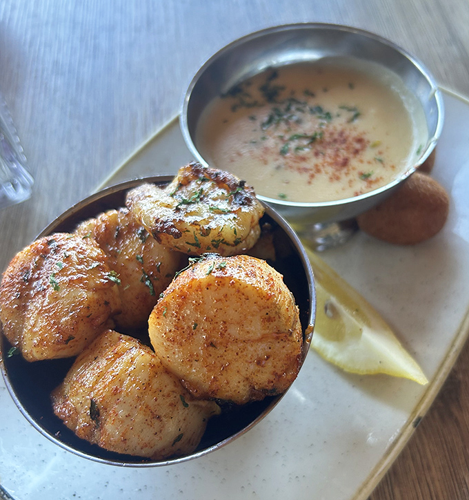 These scallops aren't just seared&mdash;they're transformed into buttery medallions of ocean candy that practically melt on contact with your taste buds.