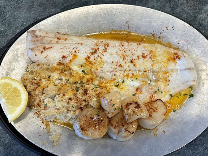 Seafood that makes you forget you're in Pennsylvania. These scallops are seared to golden perfection, like little ocean treasures on a silver platter.