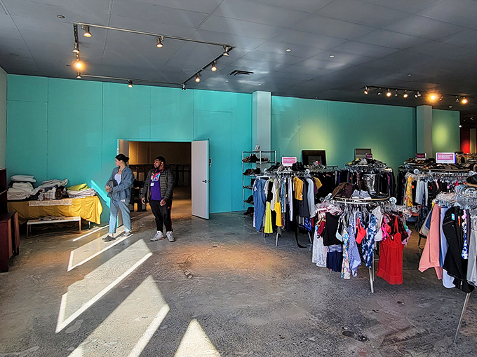Bright turquoise walls frame the shopping experience, creating an atmosphere that's part boutique, part community hub, and entirely welcoming.