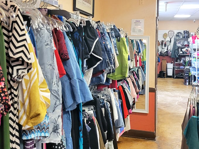 A rainbow of fabrics tells stories of previous lives, now waiting for new adventures. Fashion recycling at its most colorful.