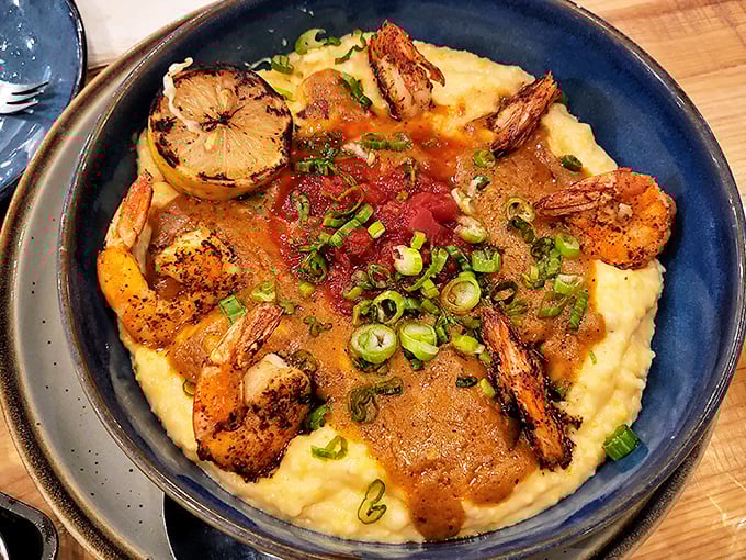 Southern comfort meets coastal luxury in this bowl of shrimp and grits. The creamy base cradles perfectly cooked shrimp while green onions add a fresh pop.