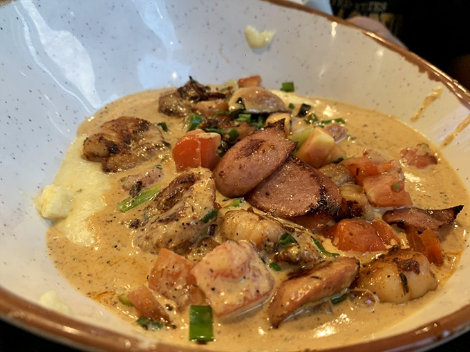 Not your mama's shrimp and grits, unless your mama was a culinary genius. Those sausage coins and that velvety sauce deserve their own thank-you note.