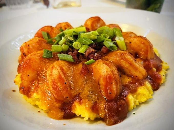 The legendary shrimp and grits&mdash;a golden pool of creamy cornmeal cradling plump shrimp and bacon, like a Lowcountry lullaby on a plate.