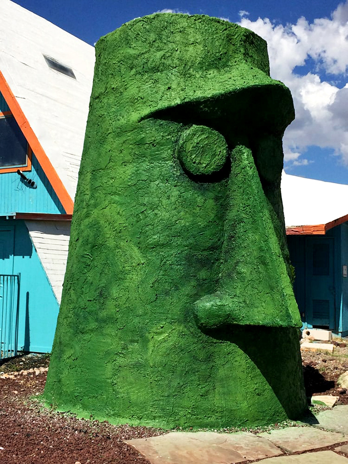 The textured surface catches the desert sun, creating shadows that give this concrete creation surprising depth and character.