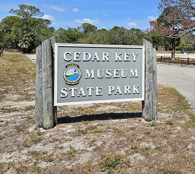 This unassuming sign marks the threshold to one of Florida's best-kept secrets &ndash; no neon required when nature provides the real show.