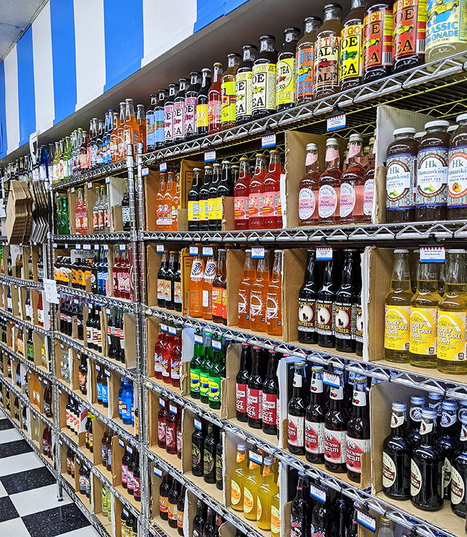 The soda wall could double as an art installation – a rainbow of glass bottles promising fizzy nostalgia in every sip.