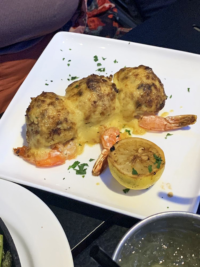 These stuffed shrimp aren't just a meal—they're an event. Plump crustaceans wearing crab imperial like it's formal attire.