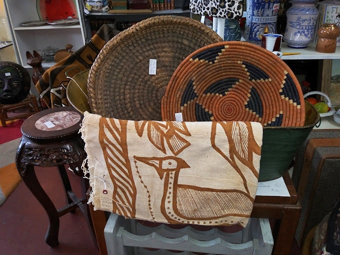 Handcrafted baskets and textiles that survived decades before "artisanal" became a marketing buzzword. That bird-patterned fabric would make your Instagram followers weep with envy.
