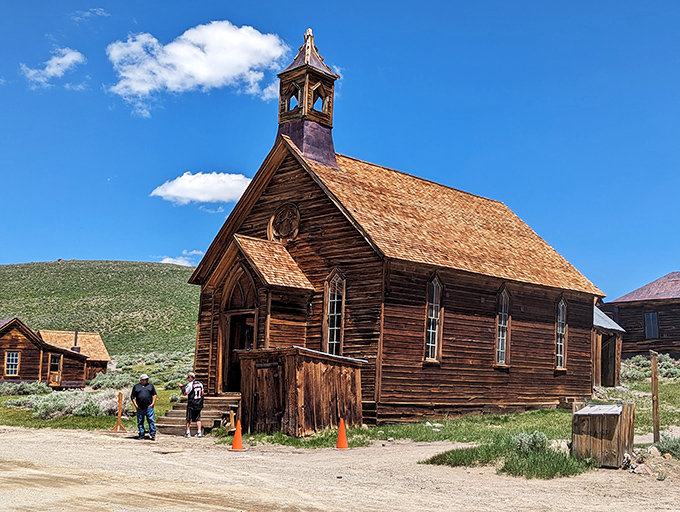 The Methodist Church stands proud with its bell tower, proving even wild towns needed Sunday salvation.