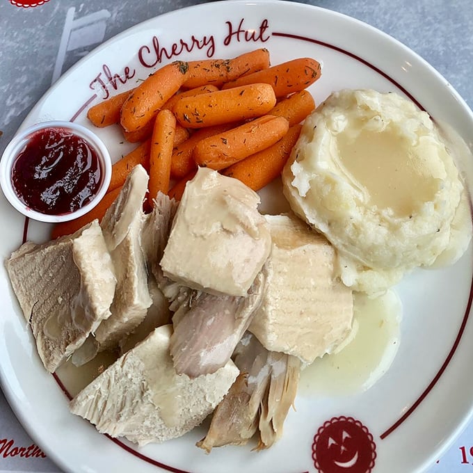 Turkey dinner with all the fixings &ndash; proof that Thanksgiving doesn't need to wait for November. That cherry sauce on the side? Game-changer.