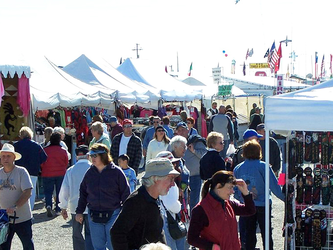 The true Quartzsite experience: a sea of sun hats and comfortable shoes navigating the white tent maze in pursuit of the perfect find.