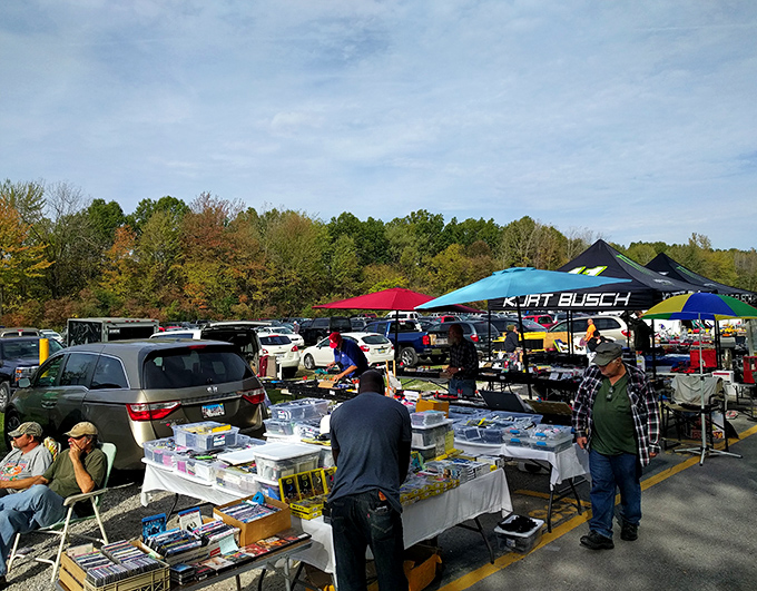 The outdoor market buzzes with activity on a perfect Ohio day. Serious collectors and casual browsers alike navigate the rows of potential finds.
