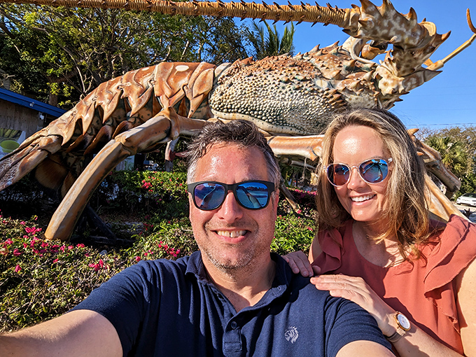 Visitors pose with Betsy, capturing that quintessential Florida vacation moment that will inevitably become next year's holiday card.
