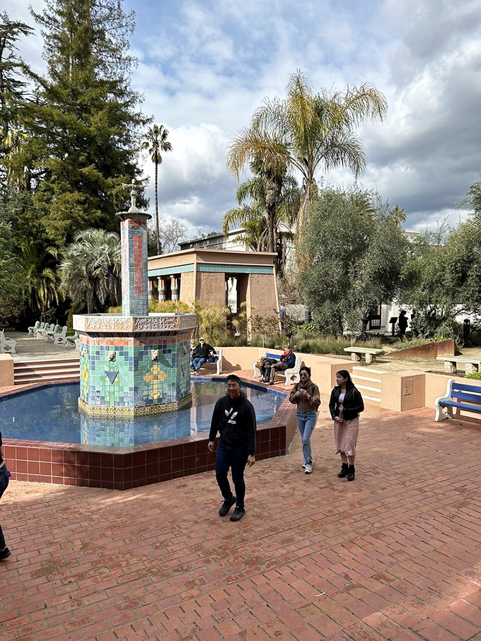 Visitors stroll through the museum grounds, blissfully unaware they've technically left California and entered ancient Egypt without a single passport stamp.