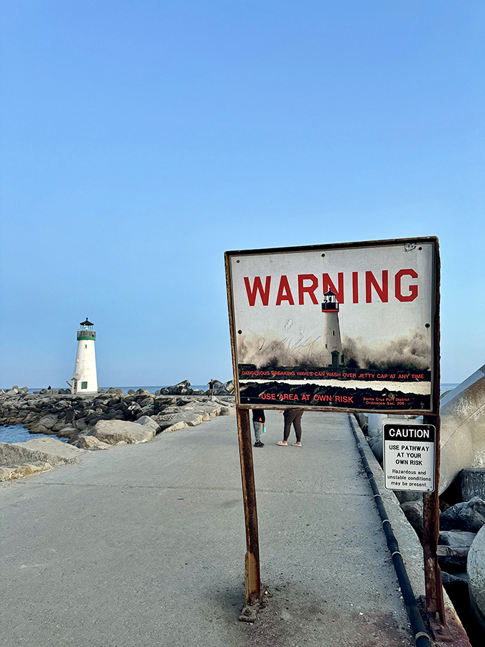 The warning sign adds a dash of drama to your lighthouse pilgrimage. Like that friend who says "be careful" before telling you about the best hole-in-the-wall restaurant.