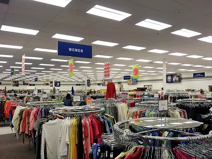 Women's clothing hangs like a rainbow of second chances, each piece waiting for its fashion comeback story.