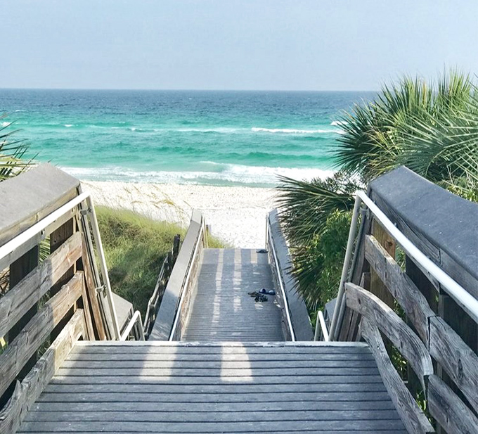 The stairway to heaven is made of weathered wood. This boardwalk delivers you straight to paradise—no pearly gates required.