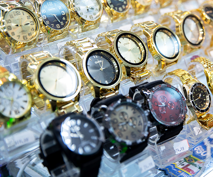 Time literally stands still at this watch display, where golden timepieces wait patiently for wrists in need of affordable bling.