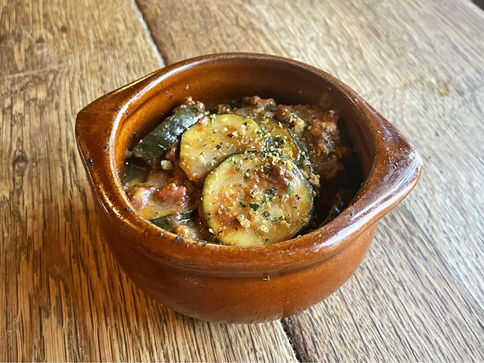 Zucchini never had it so good. This humble veggie gets the royal treatment in a savory, bubbling earthenware crock of Texas comfort.