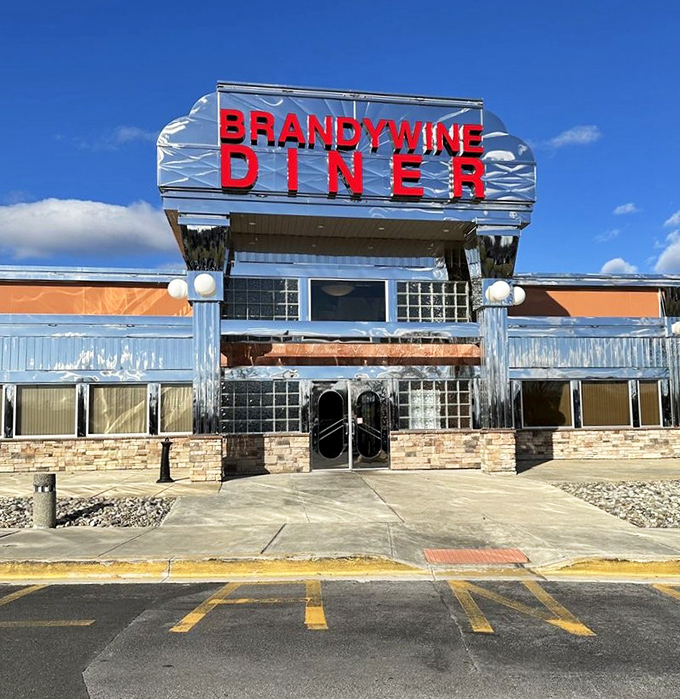 Classic diner architecture promises timeless burger perfection served with old-school American charm. 