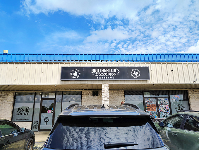 Brotherton's sleek sign promises modern BBQ with traditional roots. Where contemporary style meets timeless smoke techniques. 