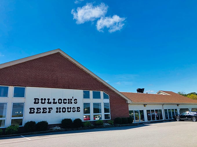 Bullock's Beef House stands proud against the blue sky, a temple to Maryland's pit beef tradition. That silhouette of a bull on the roof isn't just decoration&mdash;it's a promise.
